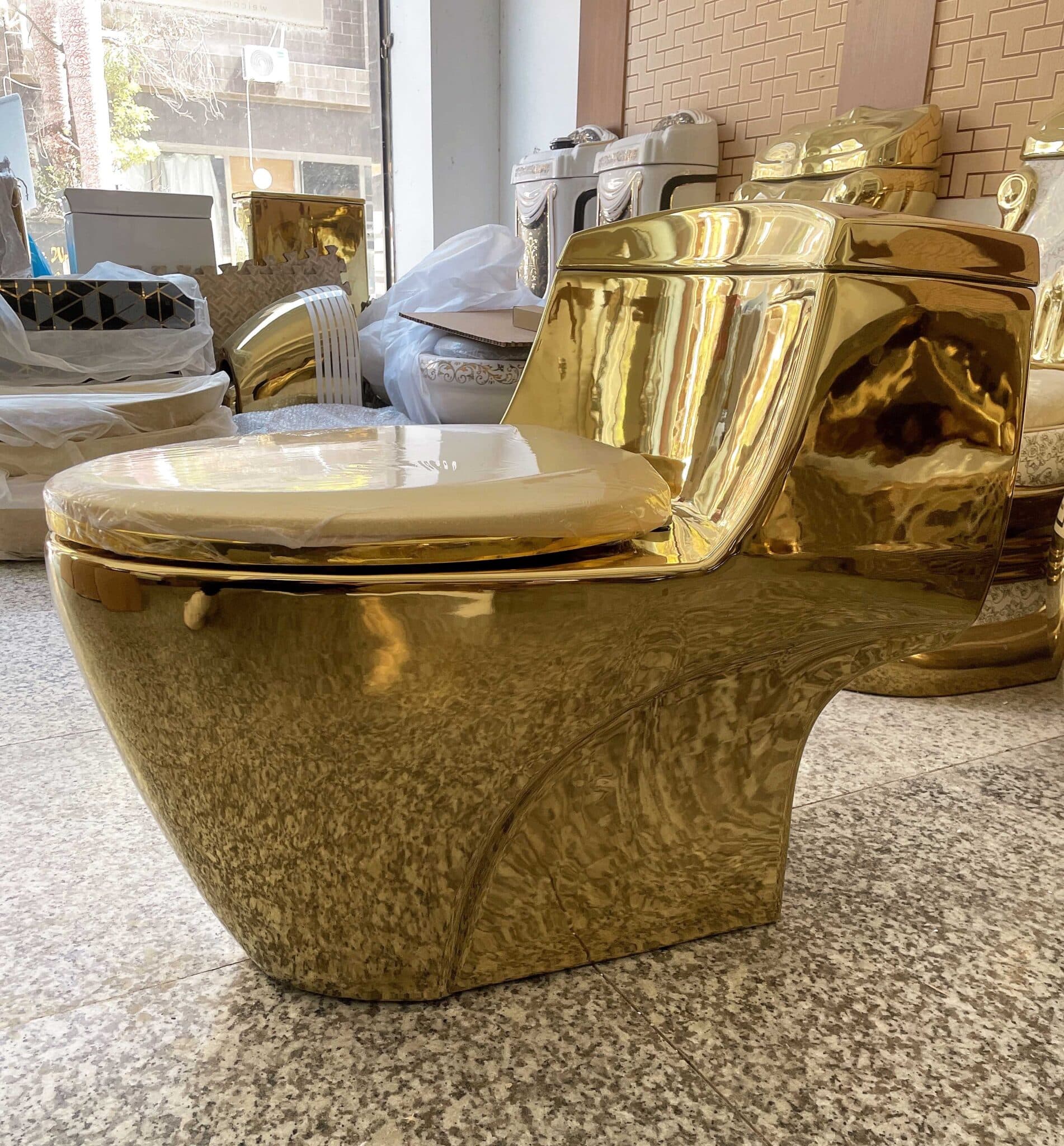 Modern Gold Toilet with a Sleek American Design - Royal Toiletry Global